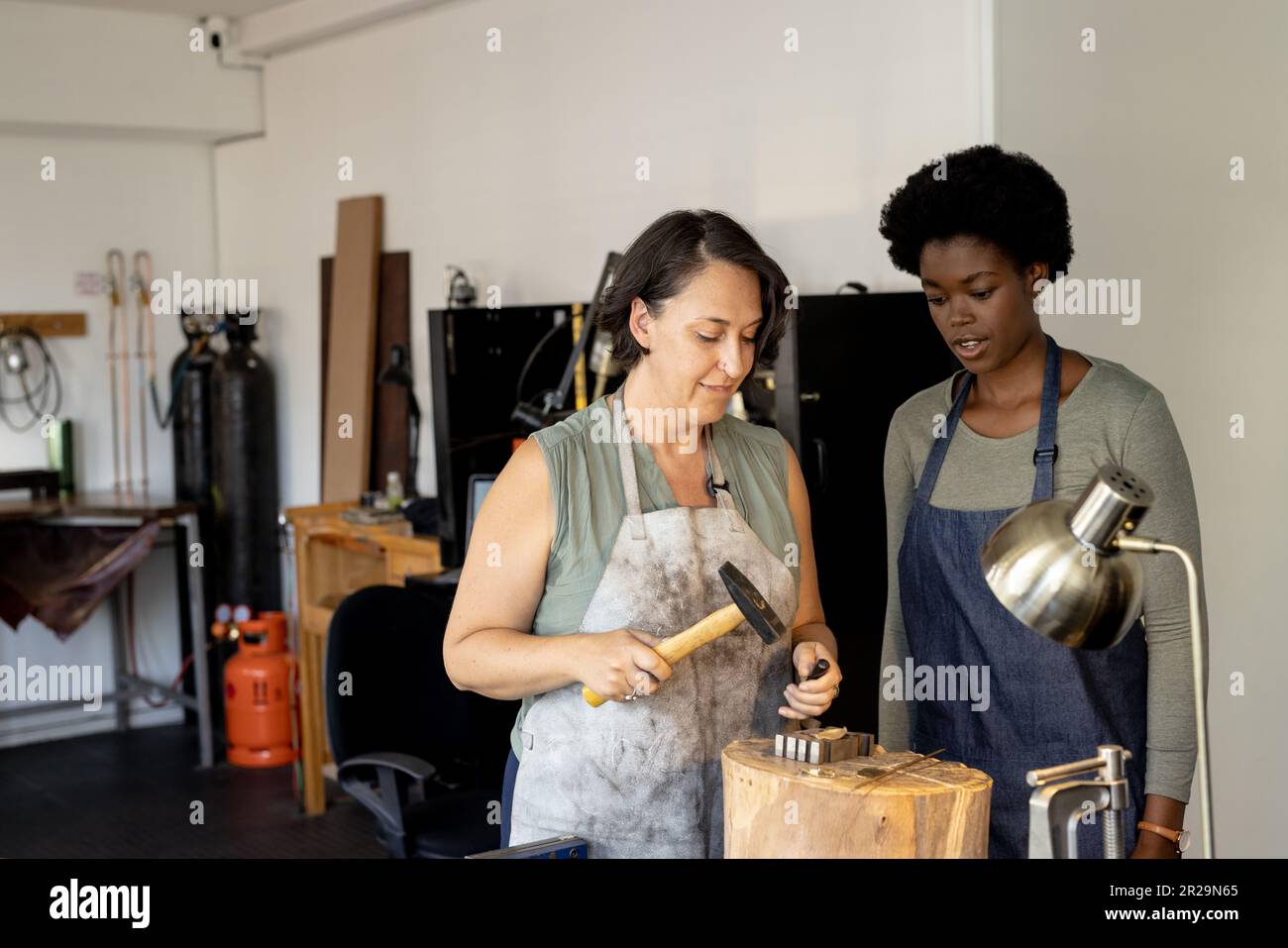 Using tools hi-res stock photography and images - Alamy