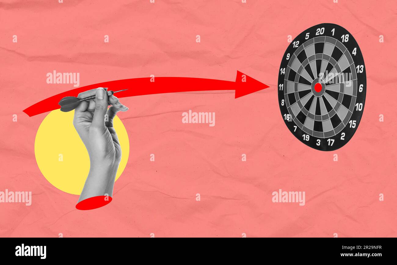 Businessman holding a dart aiming at the target - business targeting ...