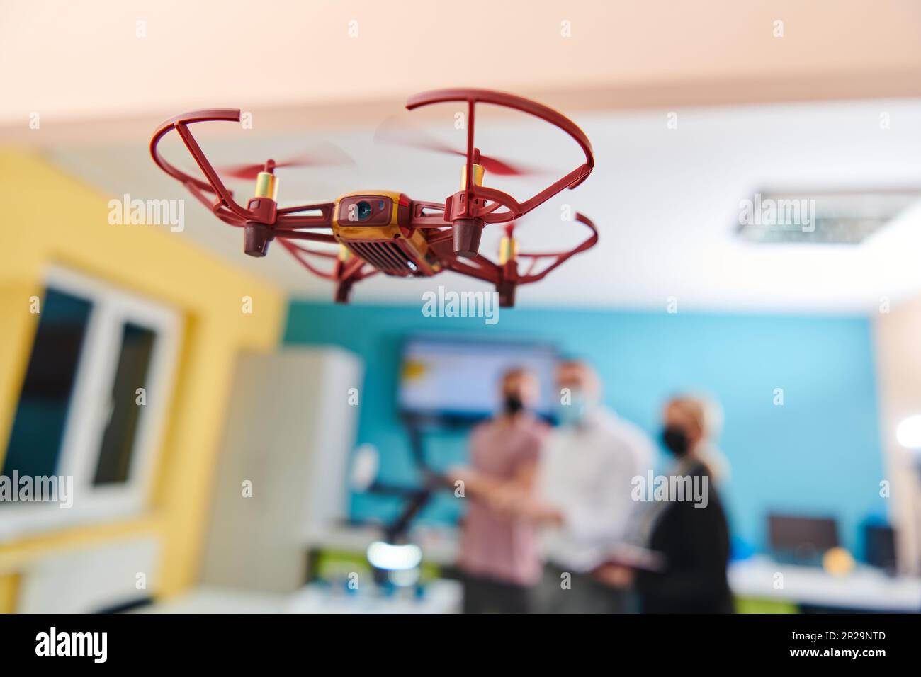 A group of students working together in a laboratory, dedicated to ...