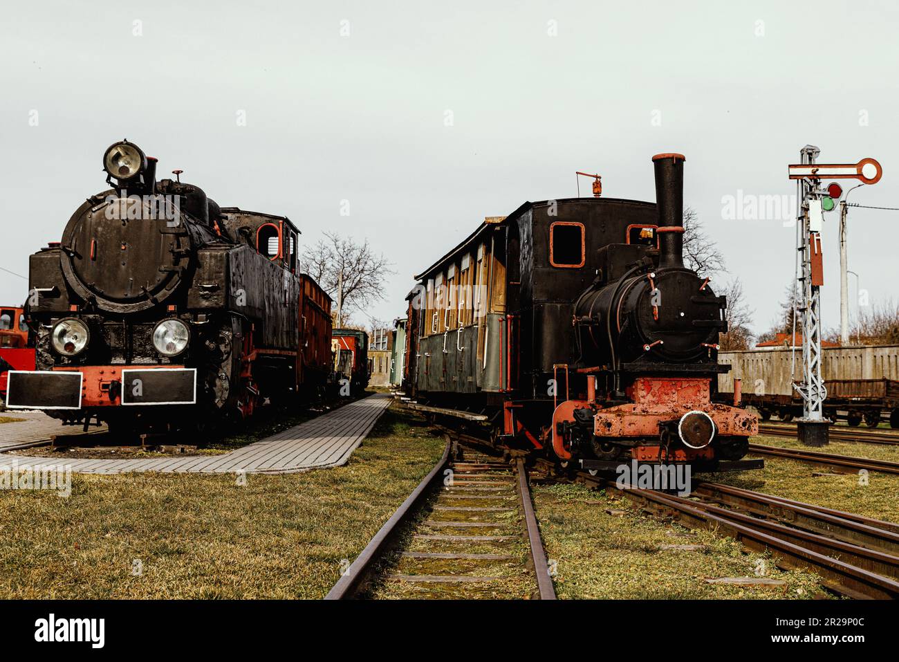 Classic steam engine at an open-air railway yard Stock Photo - Alamy