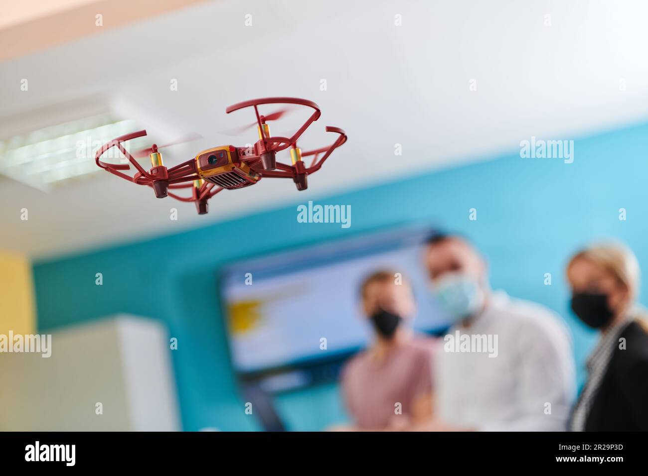 A group of students working together in a laboratory, dedicated to ...