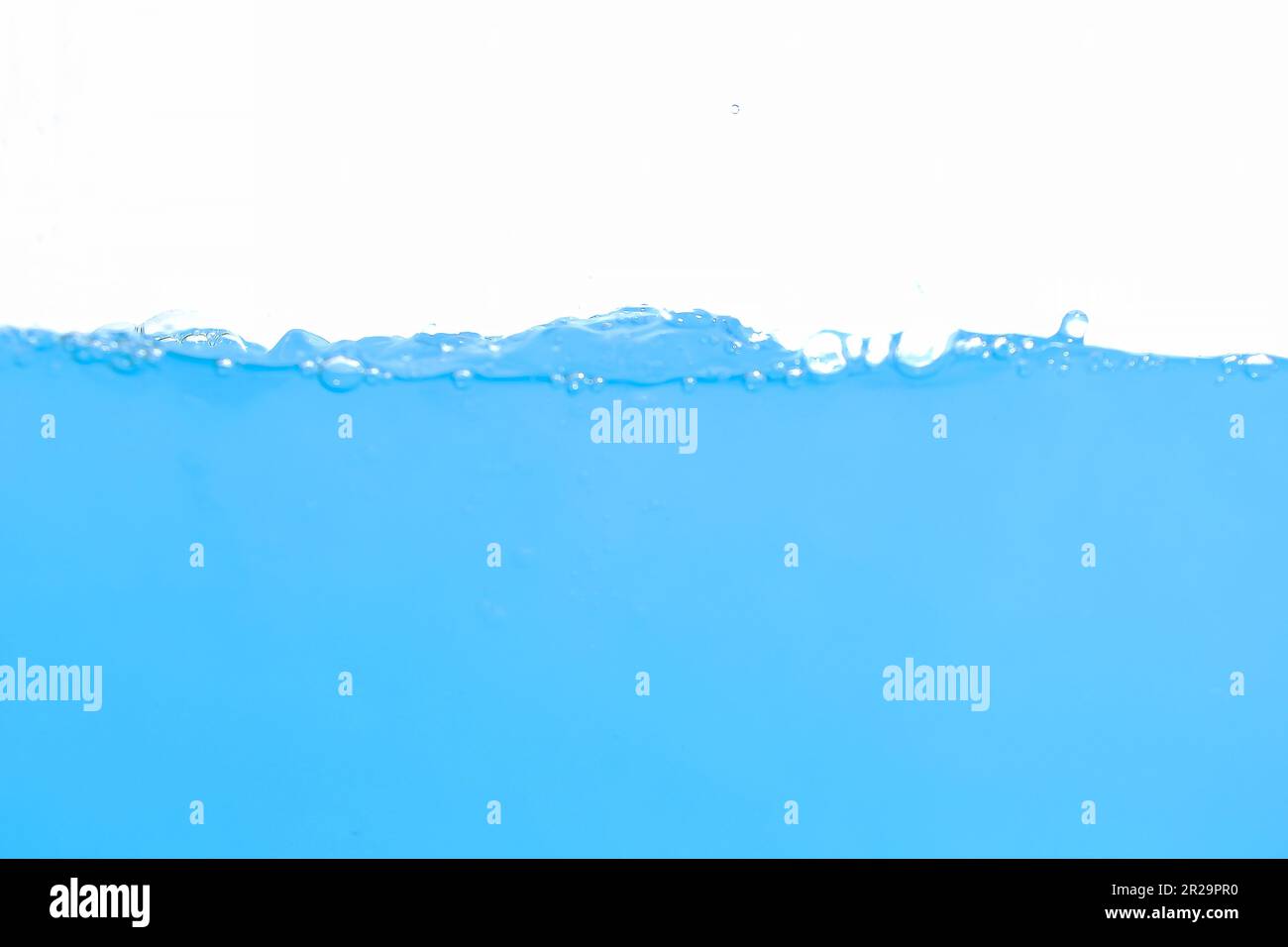 Water splash. Aqua flowing in waves and bubbles . on white background ...