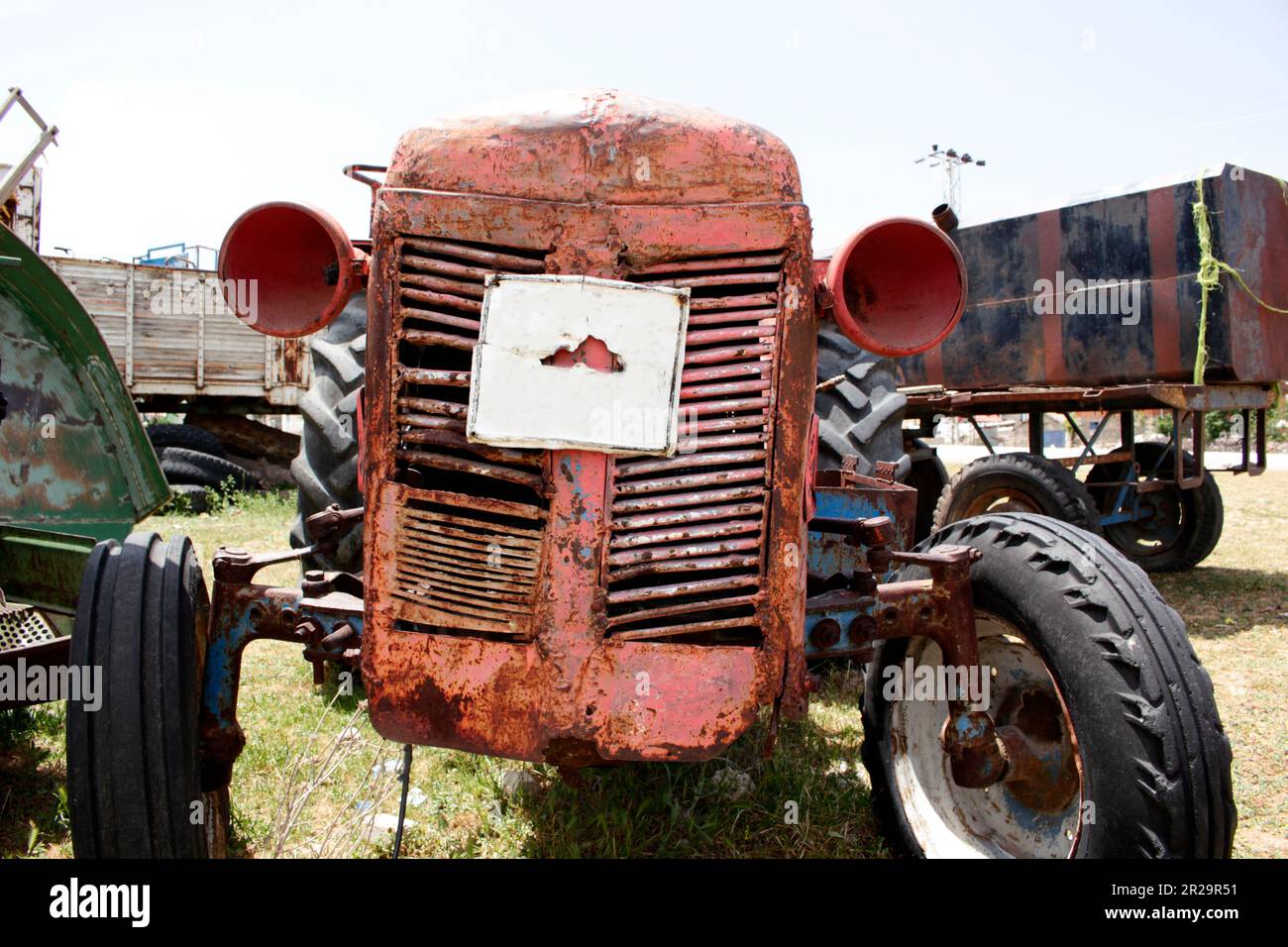 Old rusty tractor in junkyard hi-res stock photography and images - Alamy