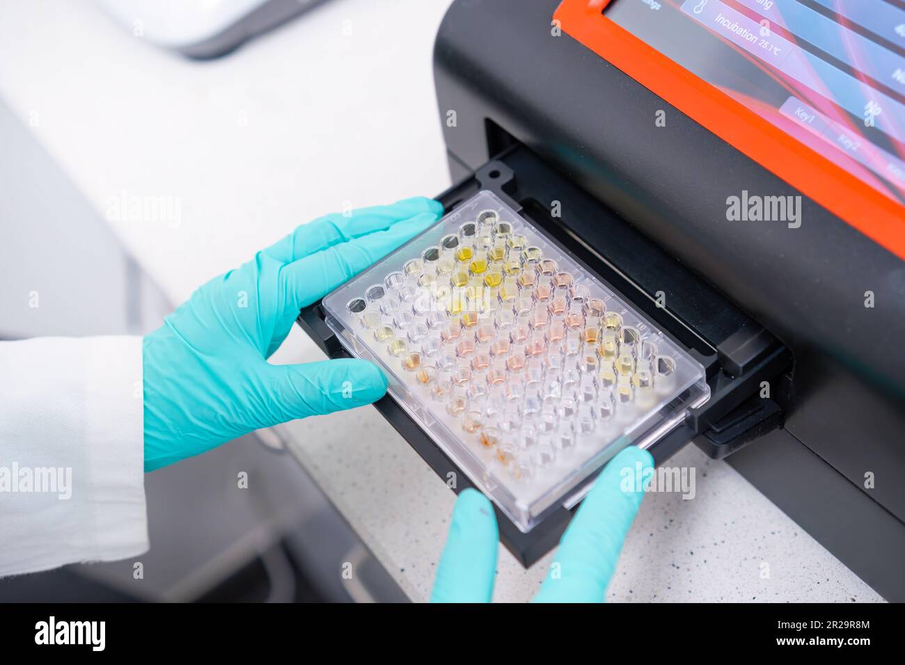 A microplate spectrophotometer is utilized by scientists to analyze DNA ...