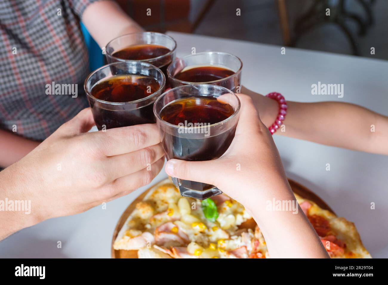 Group of people drinking coca cola hi-res stock photography and images ...