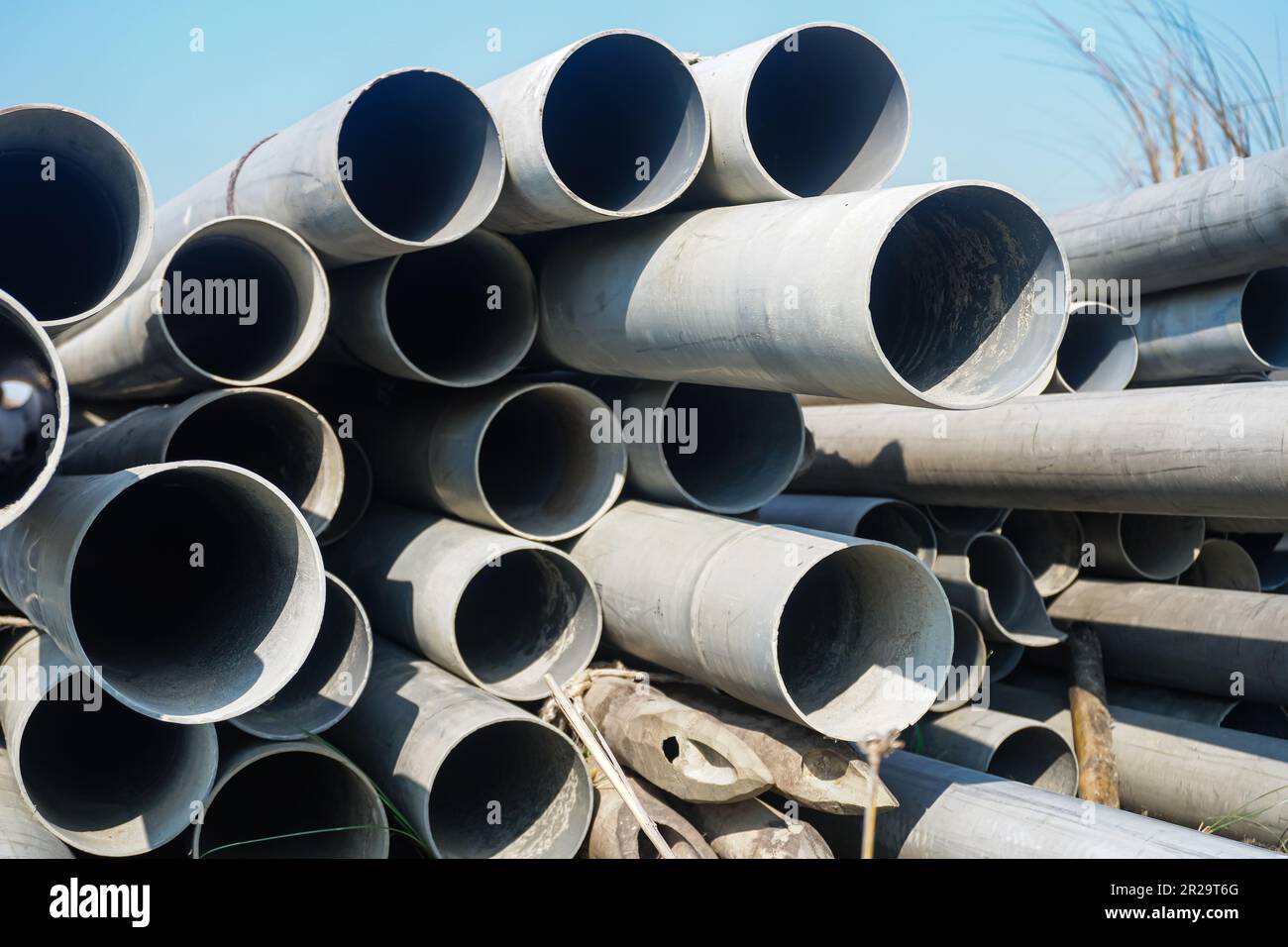 Background of big plastic pipes used at the building site.The many big ...