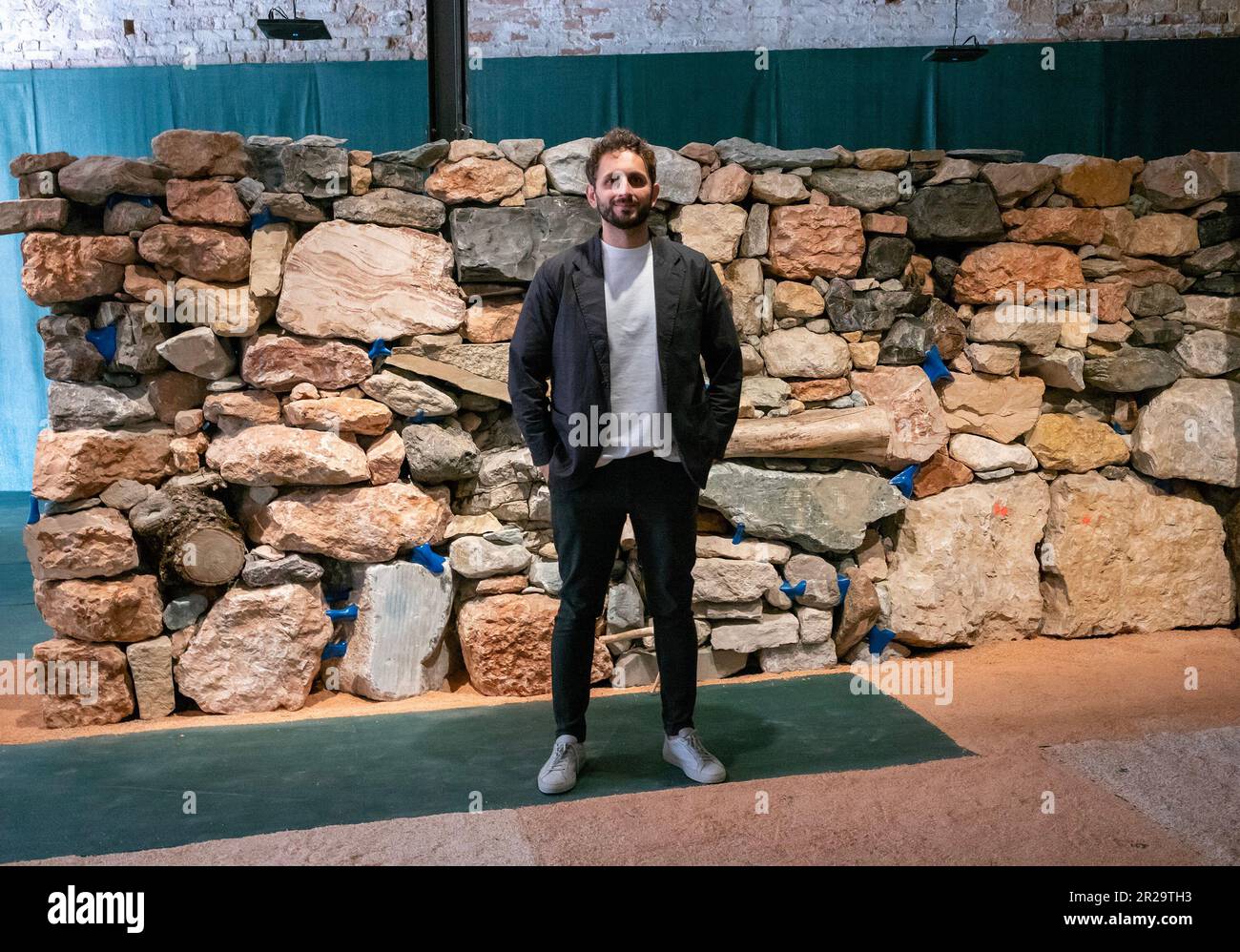 Venice, Italy, 18th May 2023 Curator Faysal Tabarrah poses inside the ...