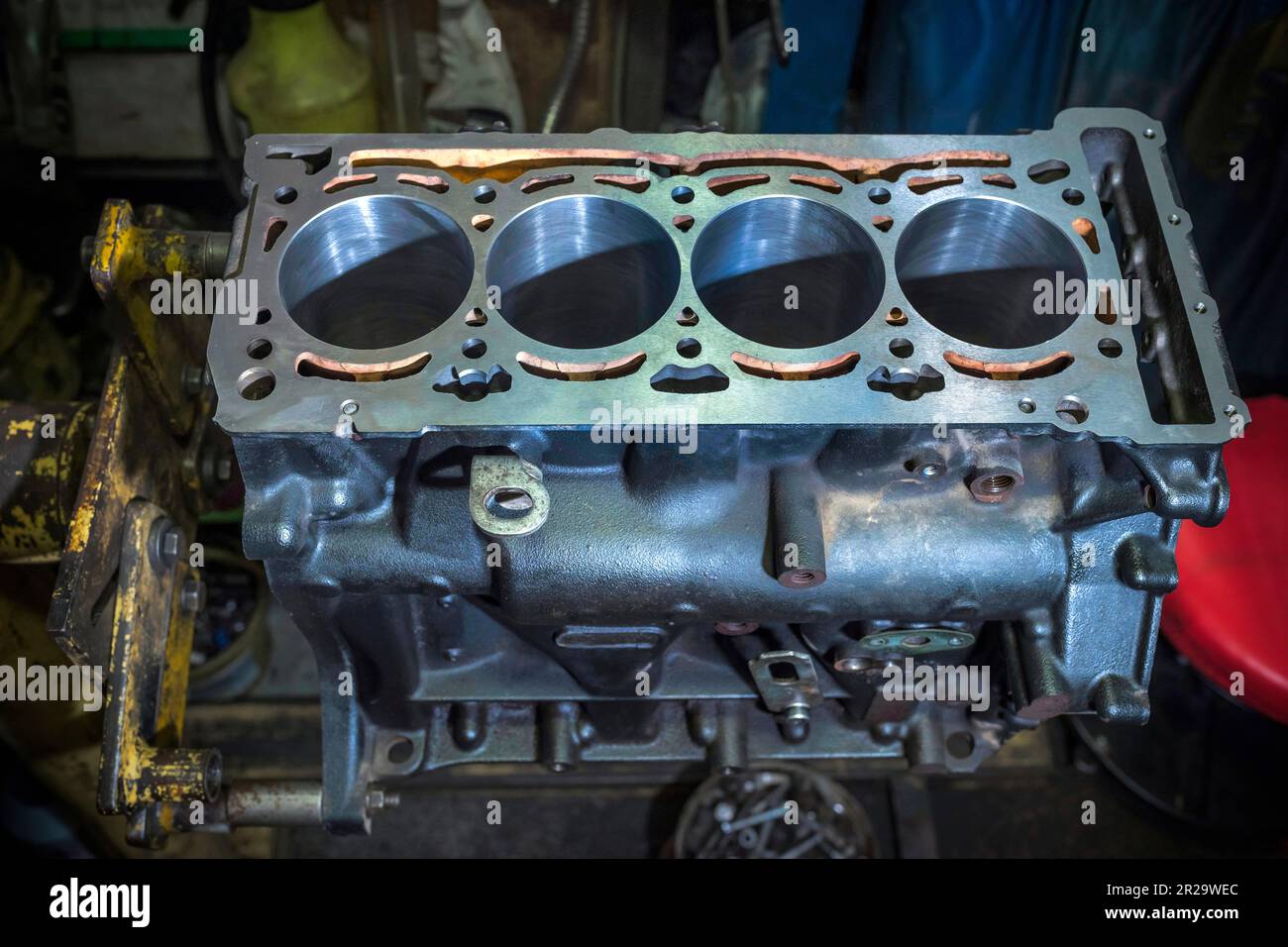 Disassembled cylinder block. Engine repair, engine part Stock Photo - Alamy