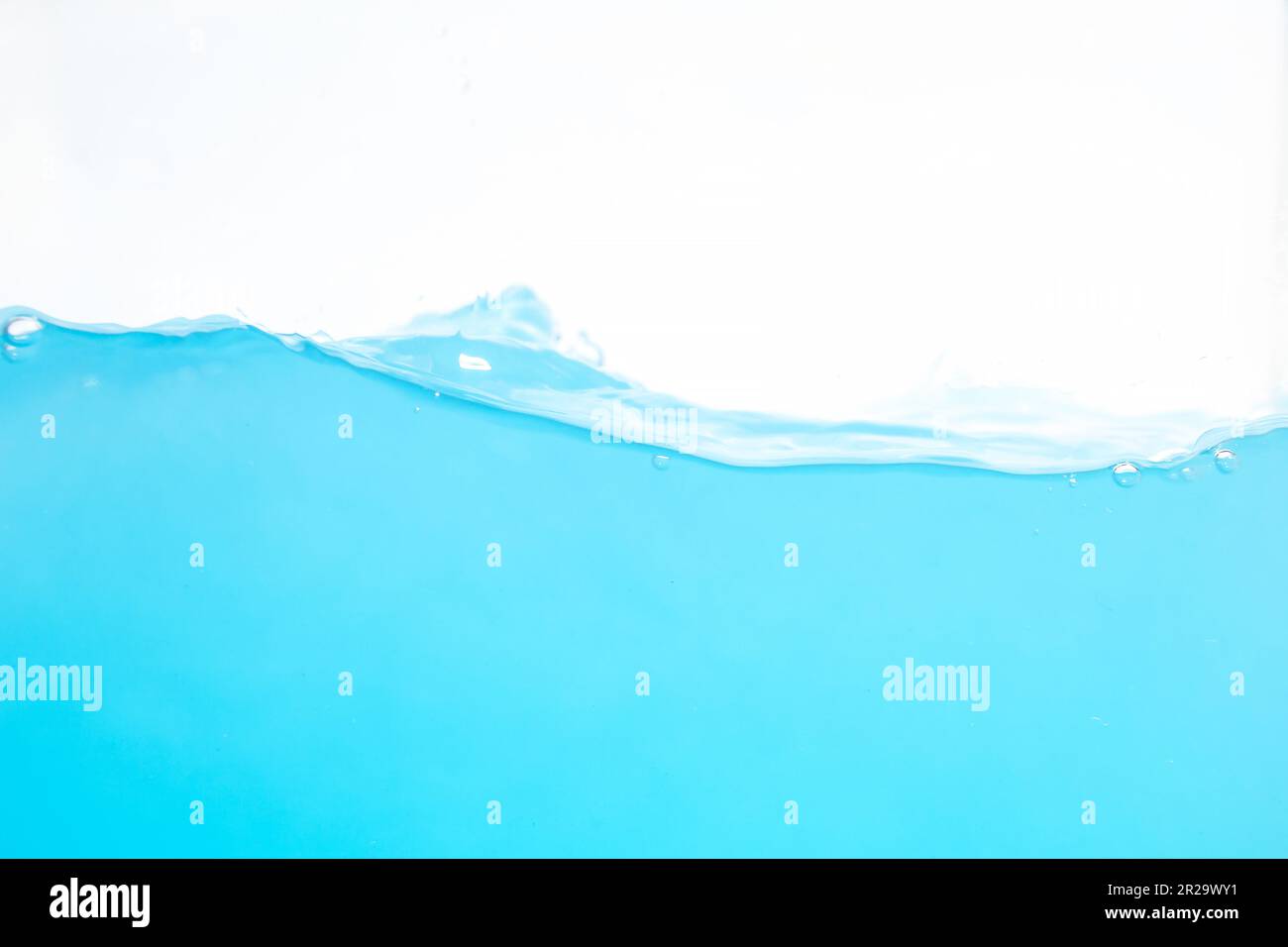 Water splash. Aqua flowing in waves and bubbles . on white background ...