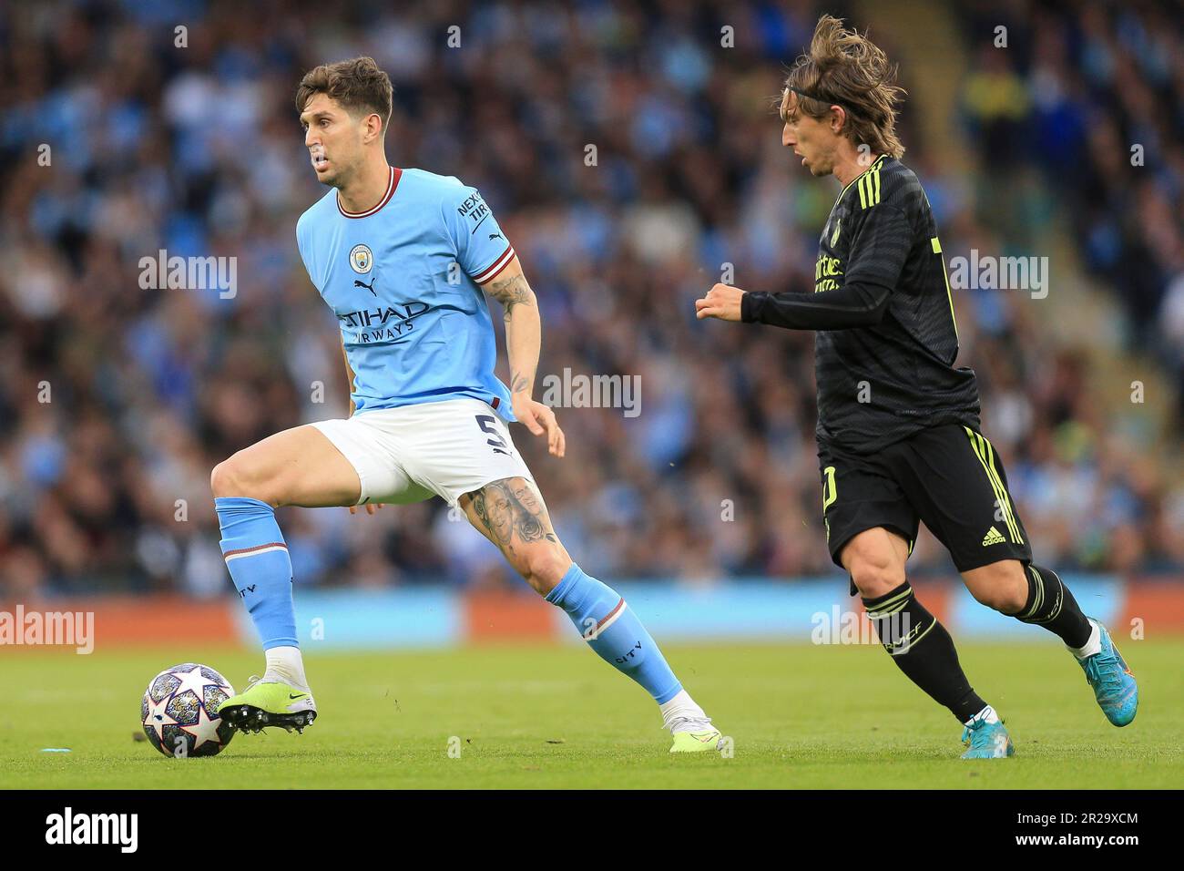 Manchester, UK. 17th May, 2023. John Stones of Manchester City and Luka ...