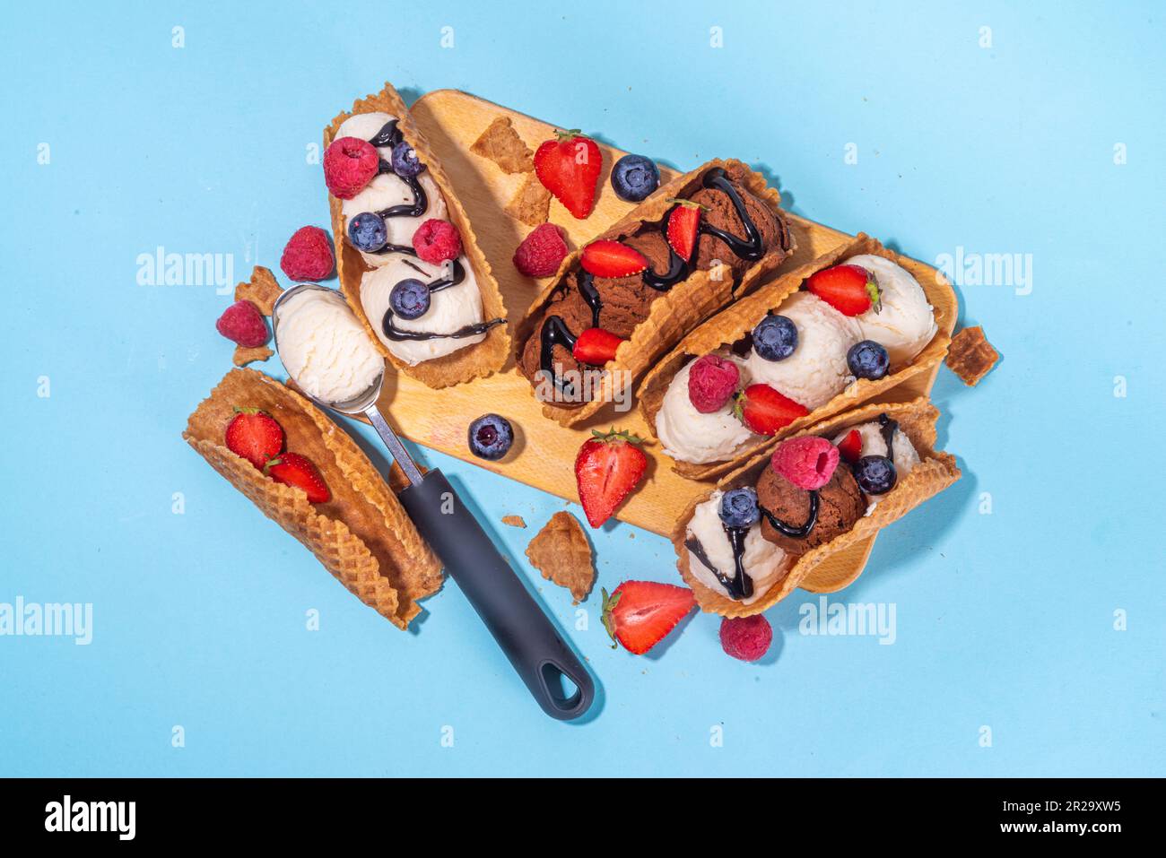 Various sweet taco ice creams. Waffle taco shells with chocolate and ...