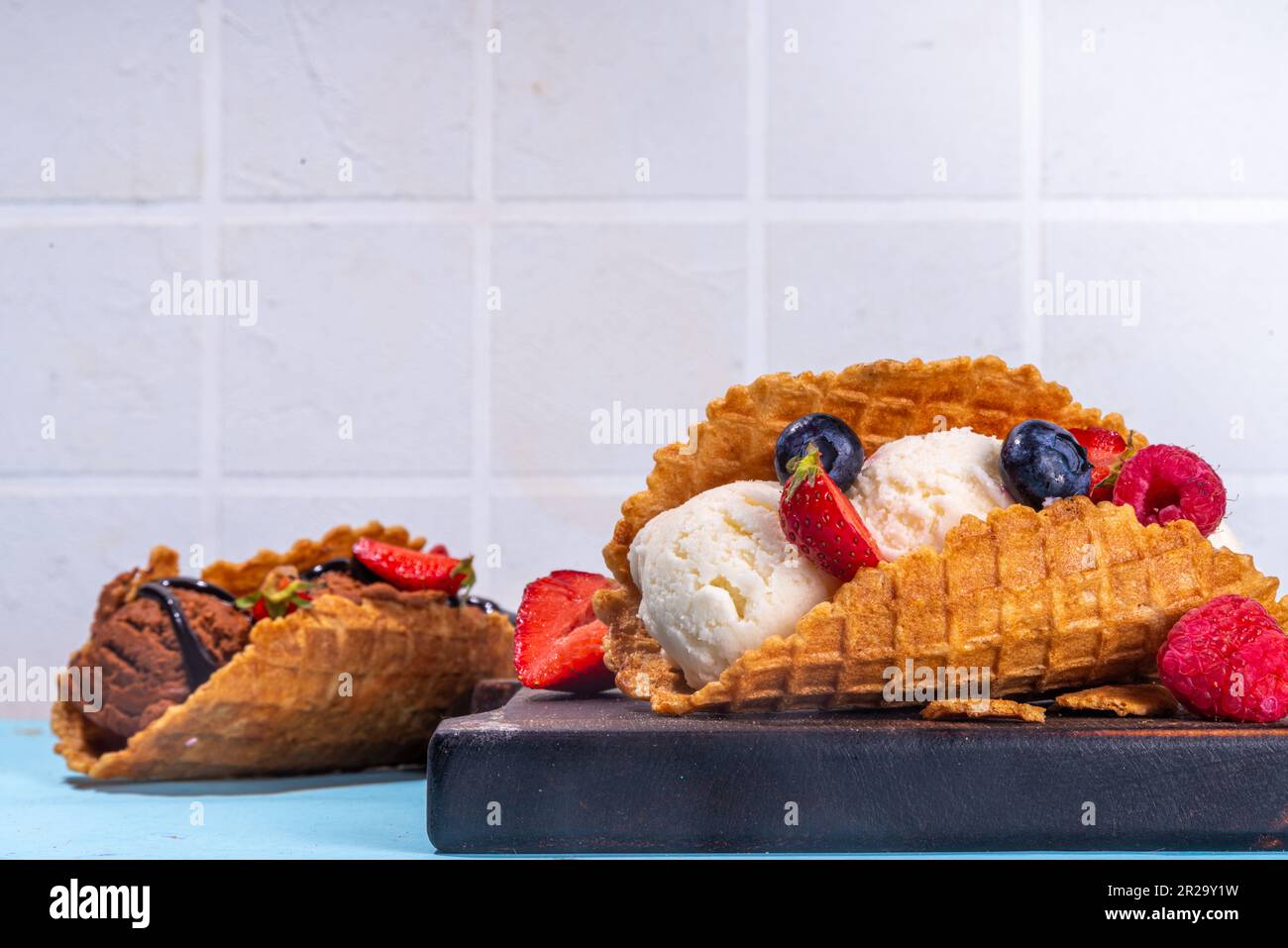 Various sweet taco ice creams. Waffle taco shells with chocolate and ...