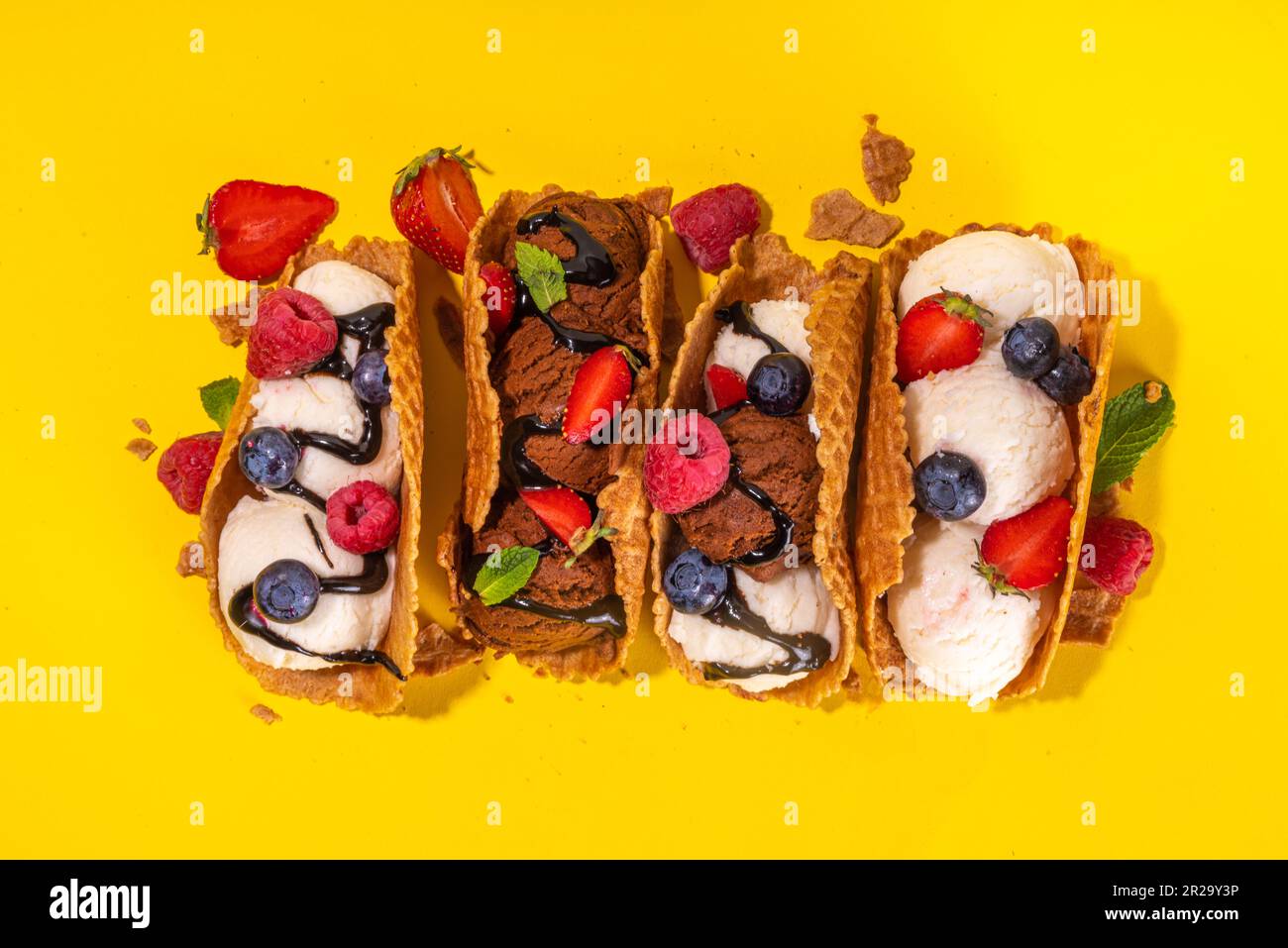 Various sweet taco ice creams. Waffle taco shells with chocolate and ...