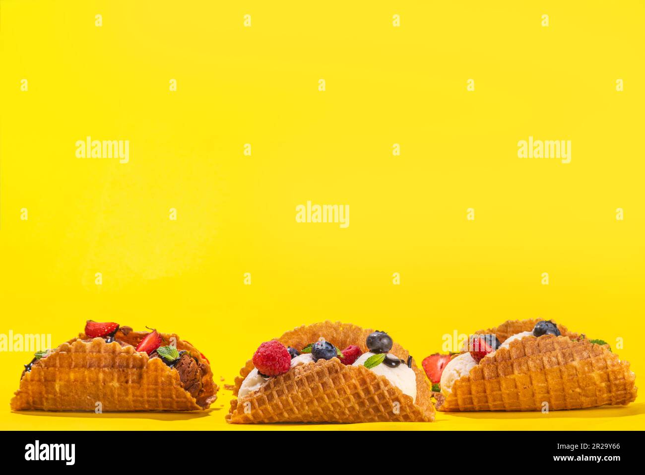 Various sweet taco ice creams. Waffle taco shells with chocolate and ...