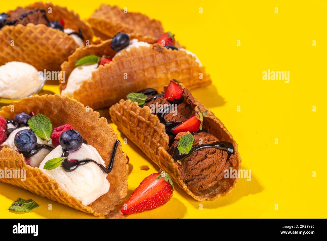 Various sweet taco ice creams. Waffle taco shells with chocolate and ...