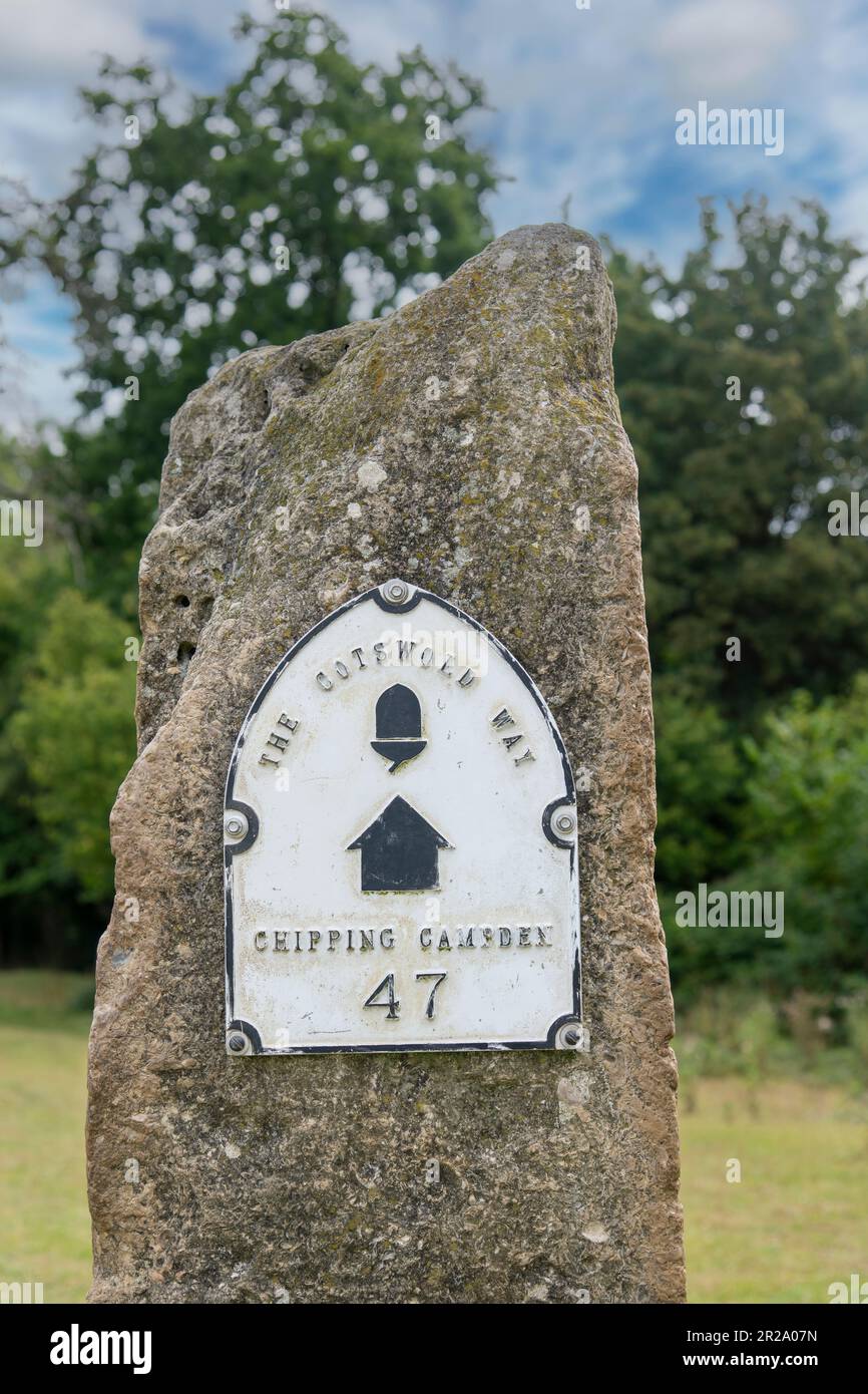Close up view of top of stone pillar with metal signage of public ...