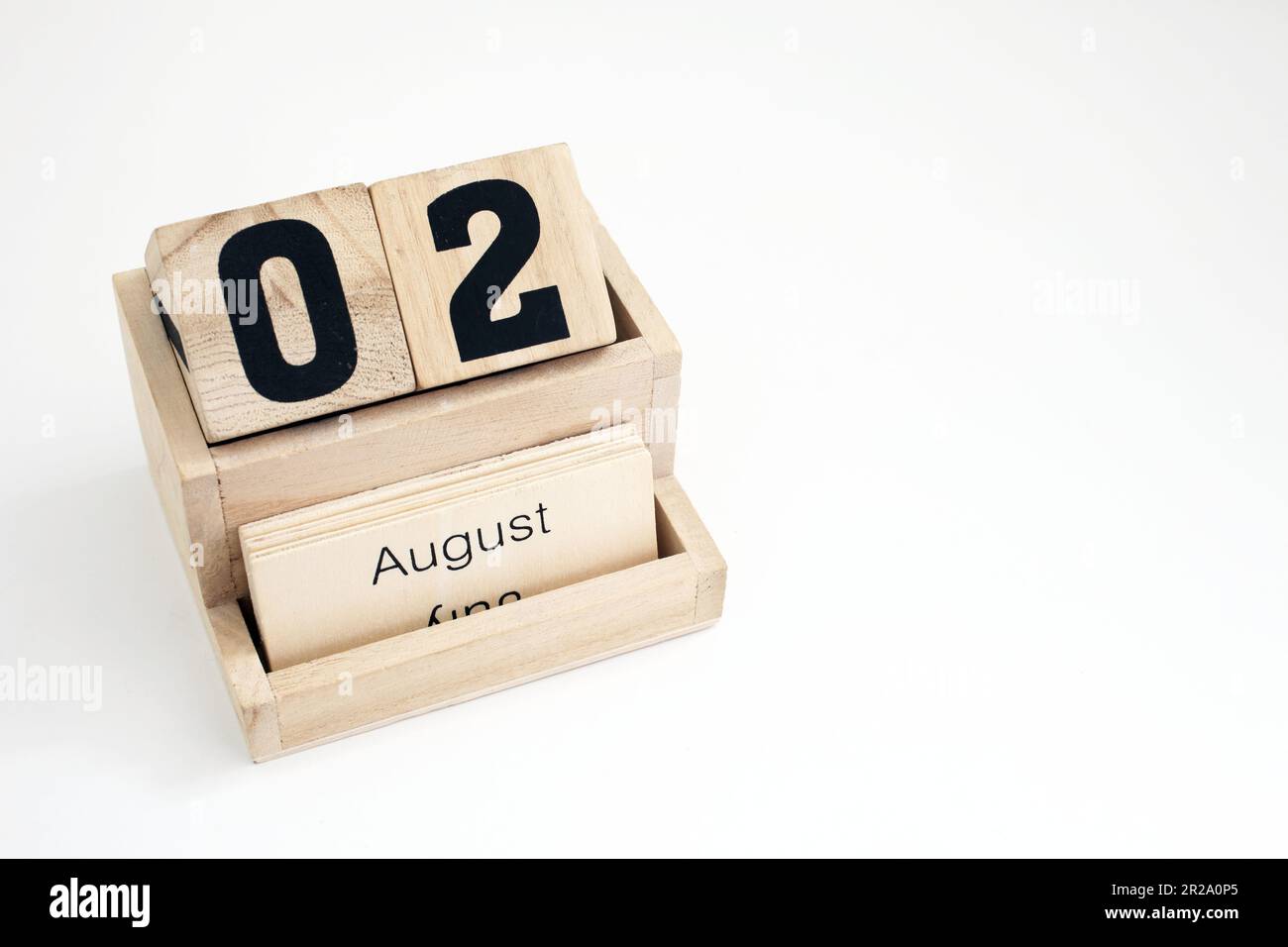 Wooden perpetual calendar showing the 2nd of August Stock Photo - Alamy