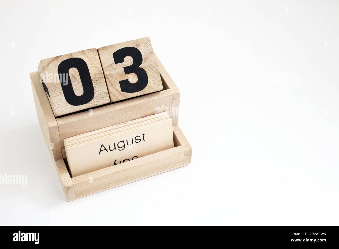 Wooden perpetual calendar showing the 3rd of August Stock Photo - Alamy