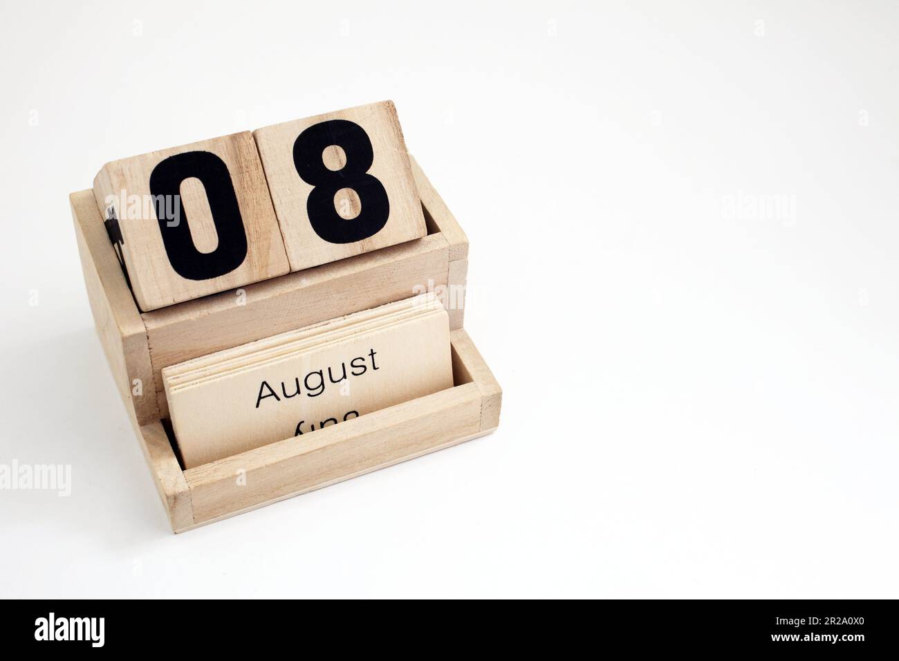 Wooden perpetual calendar showing the 8th of August Stock Photo - Alamy