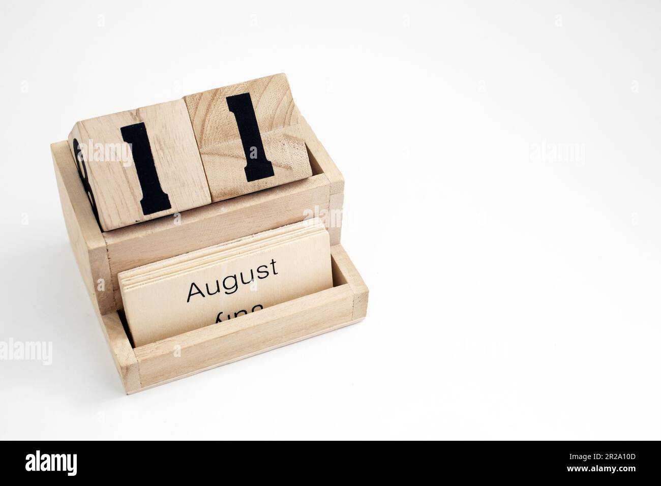 Wooden perpetual calendar showing the 11th of August Stock Photo - Alamy