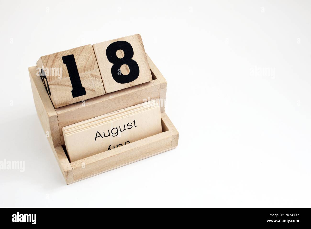 Wooden perpetual calendar showing the 18th of August Stock Photo - Alamy