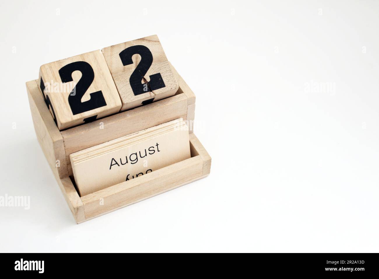 Wooden perpetual calendar showing the 22nd of August Stock Photo - Alamy