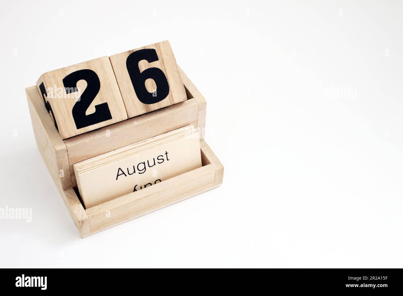 Wooden perpetual calendar showing the 26th of August Stock Photo - Alamy