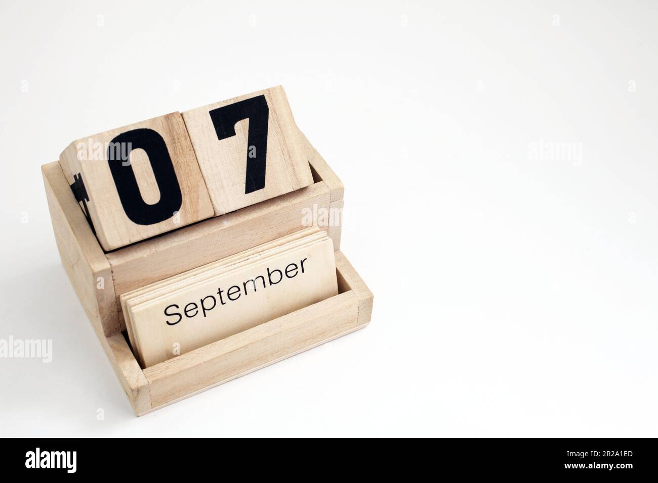 Wooden perpetual calendar showing the 7th of September Stock Photo - Alamy