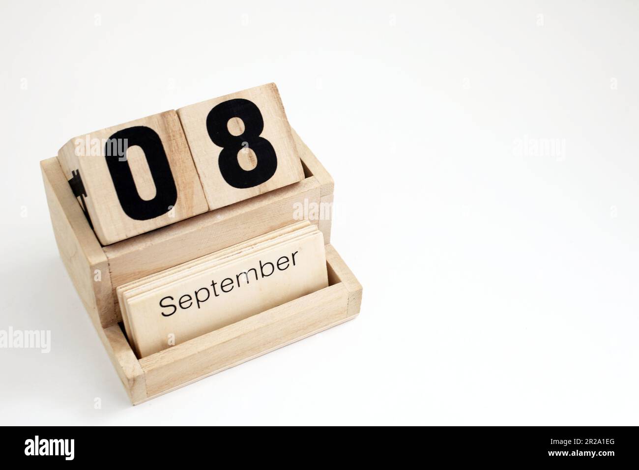 Wooden perpetual calendar showing the 8th of September Stock Photo - Alamy
