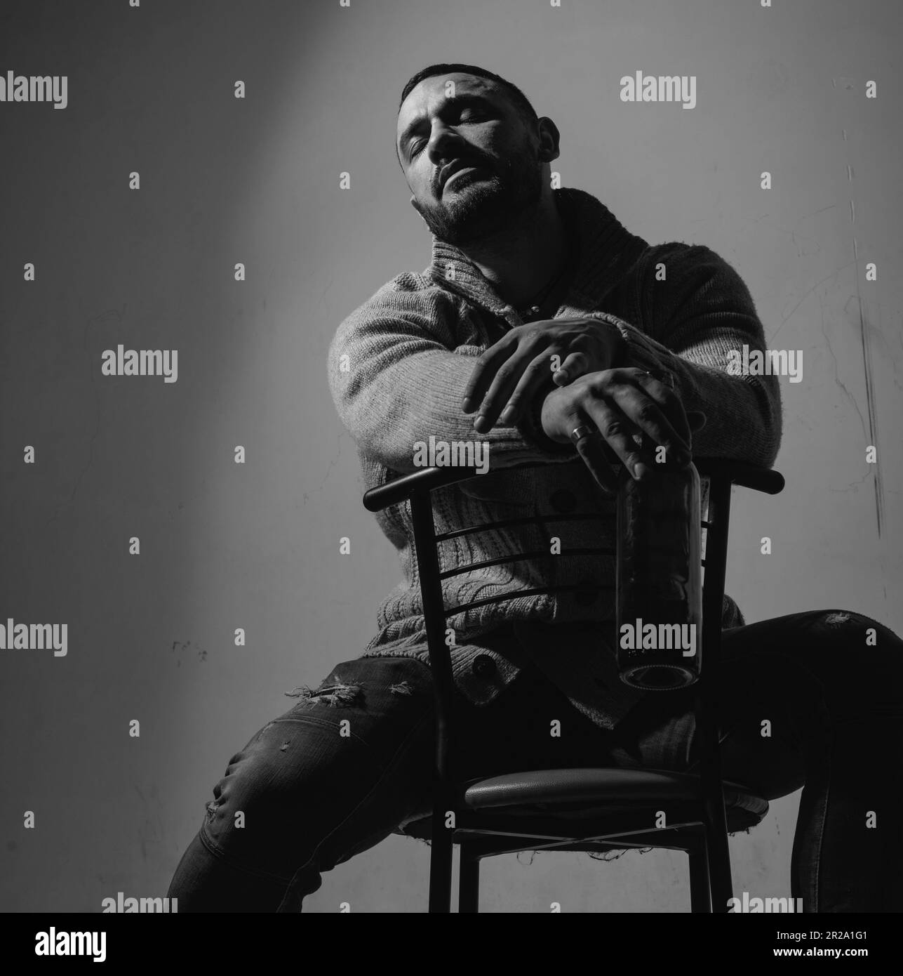 Alcoholic man with bottles wine cry. Depressed crying man. Hangover ...