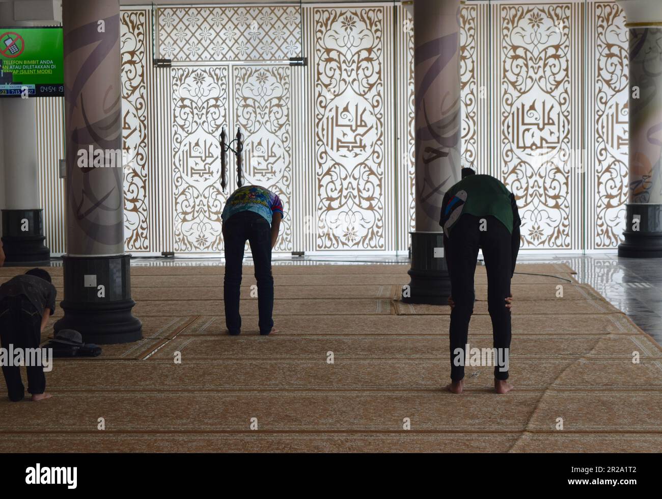 Men are praying in Crystal mosque in Terengganu, Malaysia Stock Photo ...