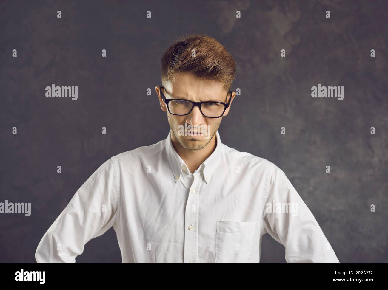 Portrait of angry young man feel outraged pissed off Stock Photo - Alamy