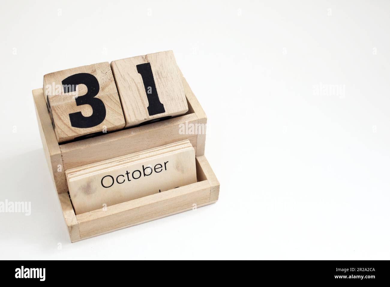 Wooden perpetual calendar showing the 31st of October Stock Photo - Alamy