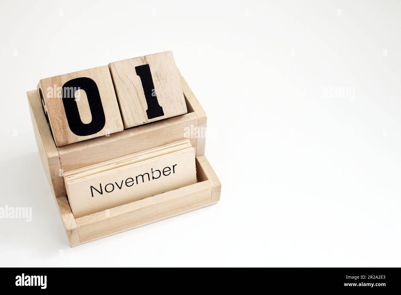 Wooden perpetual calendar showing the 1st of November Stock Photo - Alamy