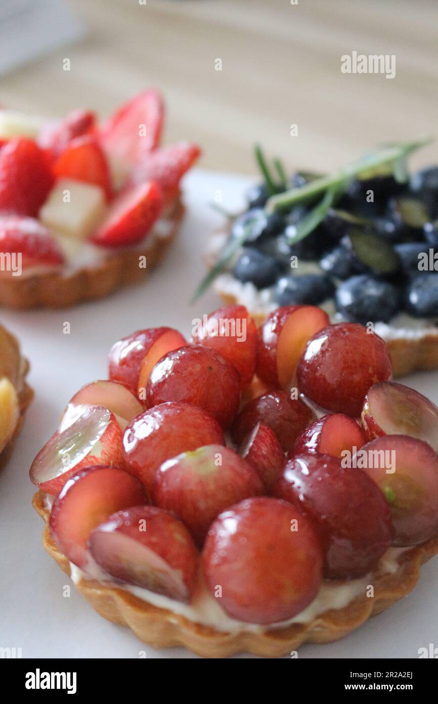 French fruit tarts strawberry tart peach tart blueberry tart grape tart ...