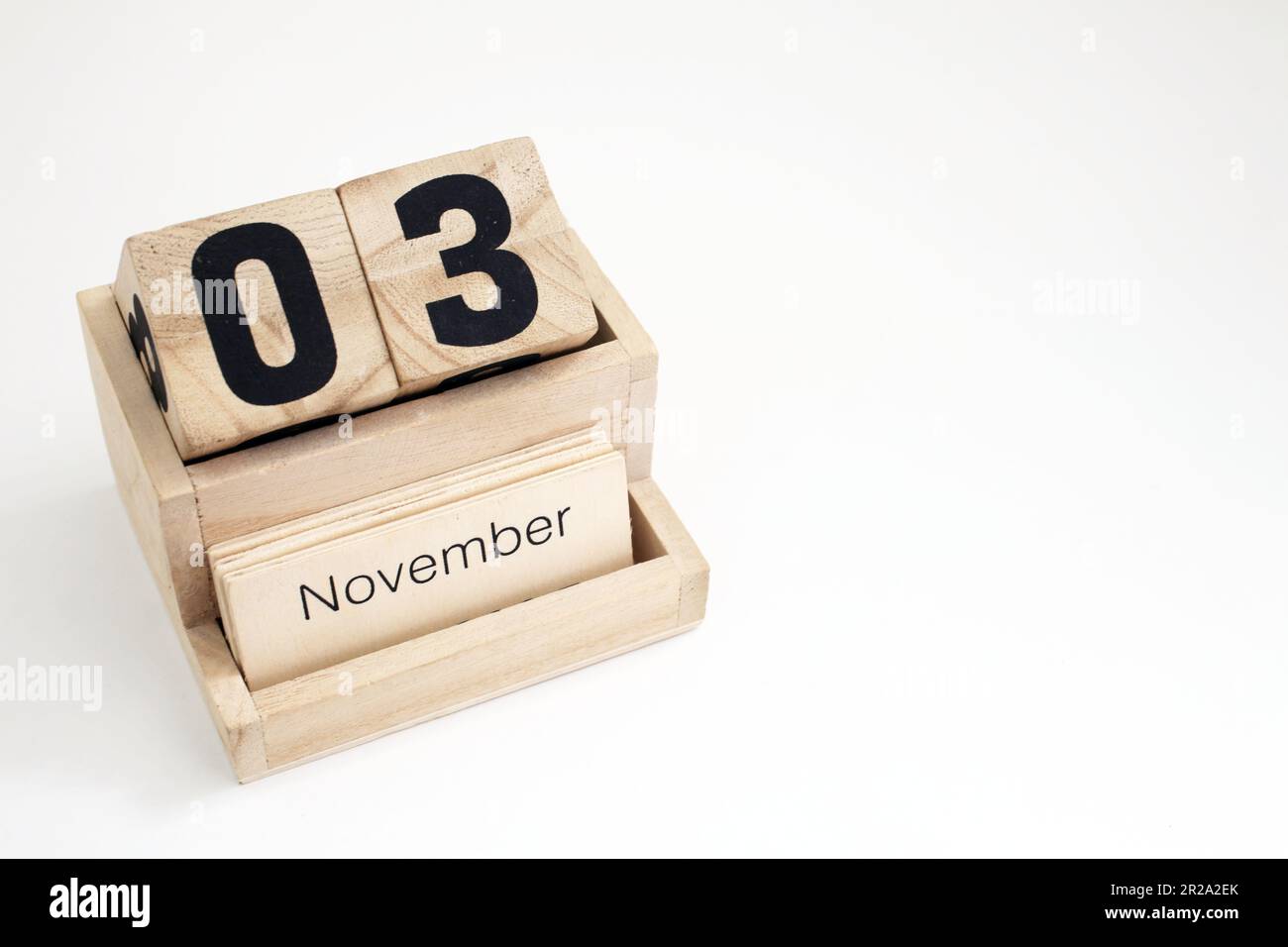 Wooden perpetual calendar showing the 3rd of November Stock Photo - Alamy