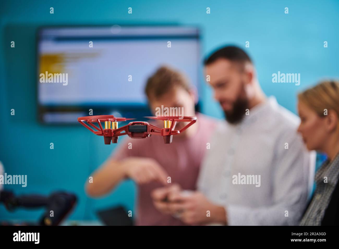 A group of students working together in a laboratory, dedicated to ...