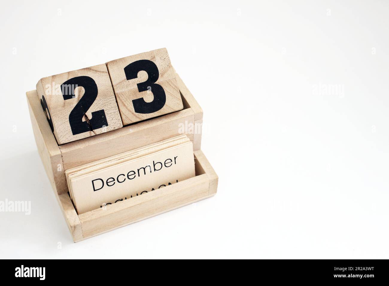 Wooden perpetual calendar showing the 23rd of December Stock Photo - Alamy