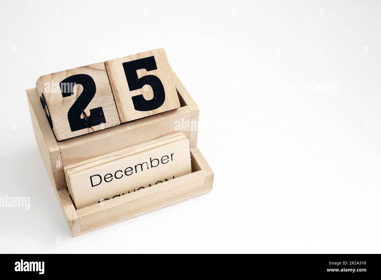 Wooden perpetual calendar showing the 25th of December Stock Photo - Alamy