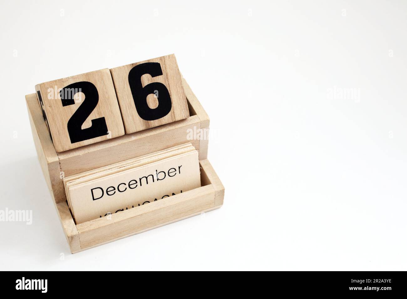 Wooden perpetual calendar showing the 26th of December Stock Photo - Alamy