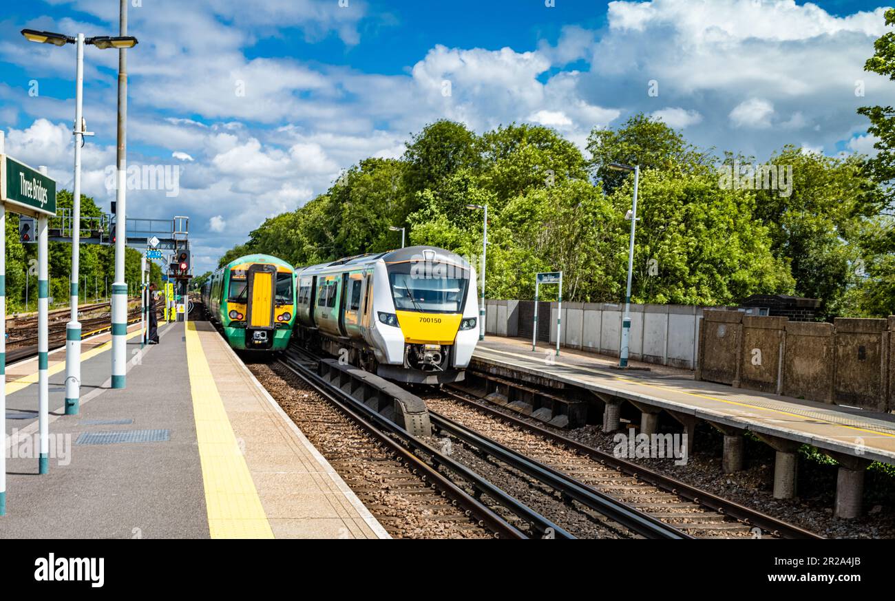 A Southern Railway train pulls out of Three Bridges Railway Station in ...