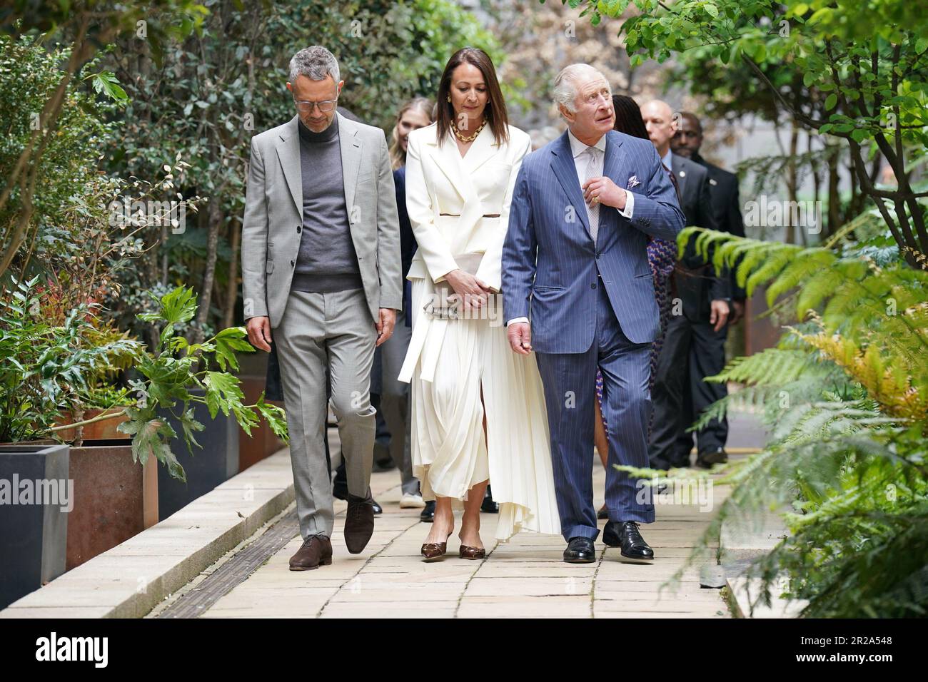 King Charles III (right) walks with Caroline Rush, chief executive of ...