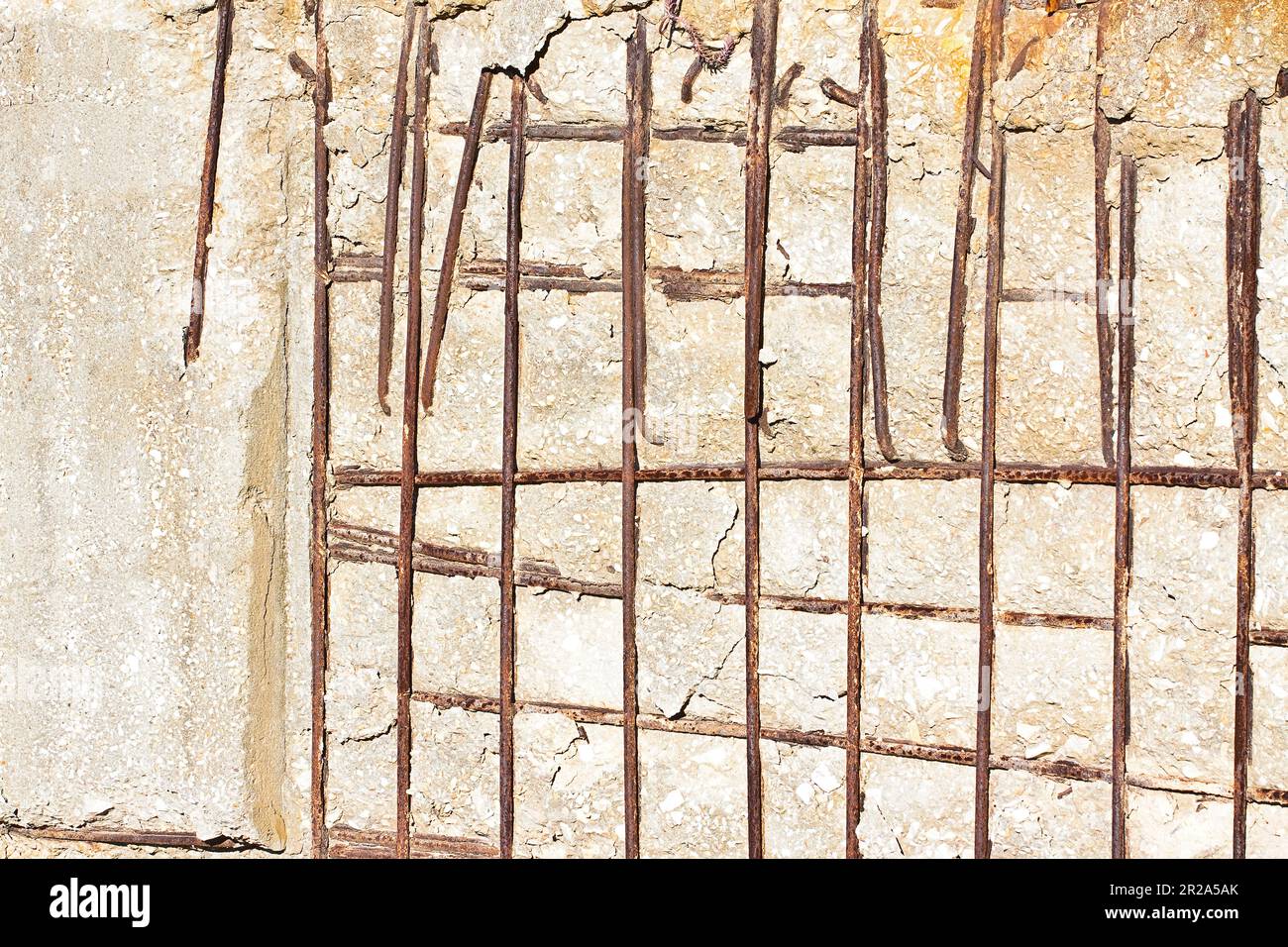 Old reinforced concrete structure with damaged and rusty metallic ...