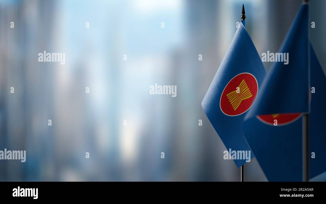 Small flags of the ASEAN on an abstract blurry background Stock Photo ...