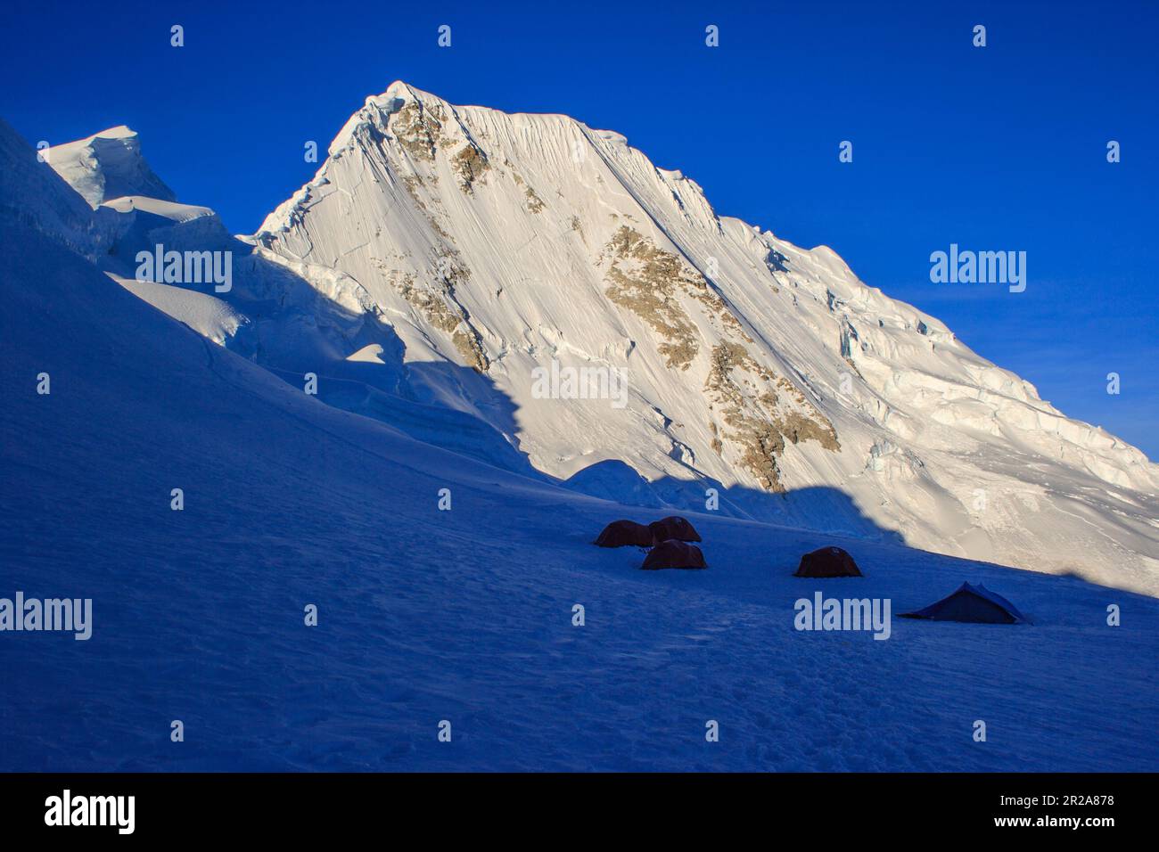 The base camp of Mount Quitaraju (Cordillera Blanca - Perù Stock Photo ...