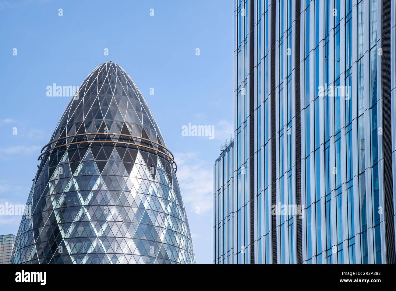 London, England-August 2022; View of top of Bullet-shaped office tower ...