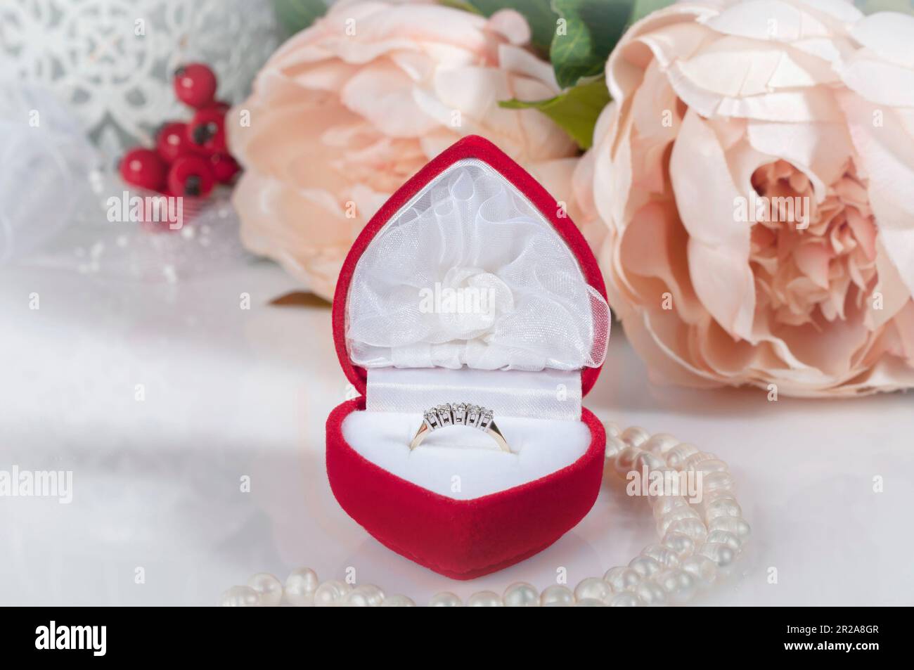 Diamond ring in a red box Stock Photo - Alamy