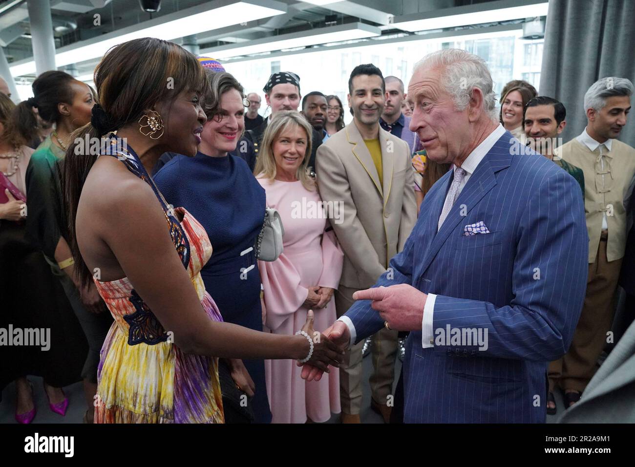 King Charles III speaks with June Sarpong during a special industry ...