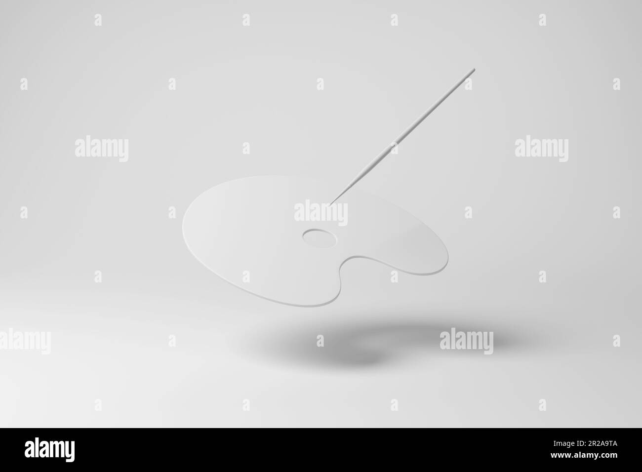 White artists palette and paint brush with shadow on white background ...