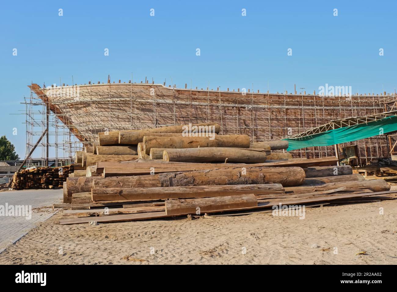 Aged huge wooden ship in scaffolding at the shipyard.Repairing old ...